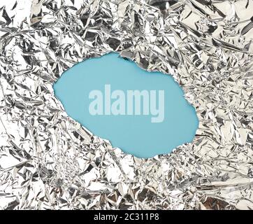 Crumpled blue foil shining texture background, bright shiny cold icy ...