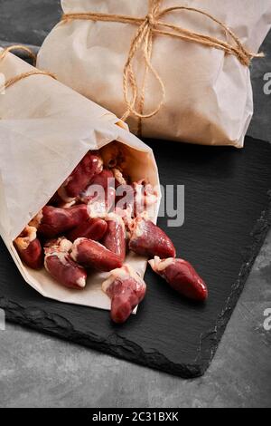 Fresh pig hearts on a white background Stock Photo - Alamy