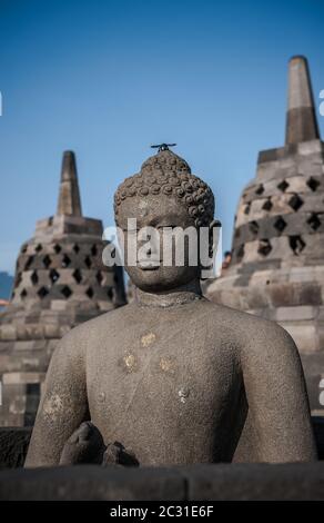 Silhouette Borobudur Temple with the Buddha statue at dawn, Yogyakarta ...