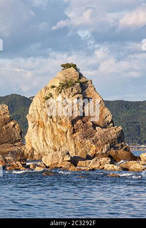 The separate pillar-rock of the Hashigui-iwa bridge near Kushimoto at ...