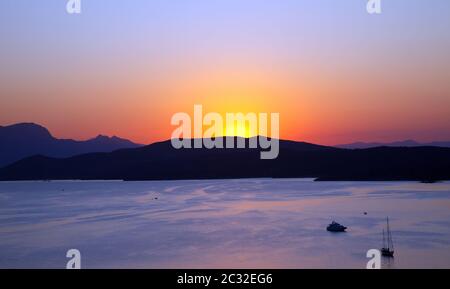 Bright colorful sunset over the sea, evening landscape Stock Photo - Alamy
