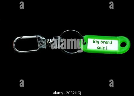 Key holder green label holder with text Stock Photo - Alamy