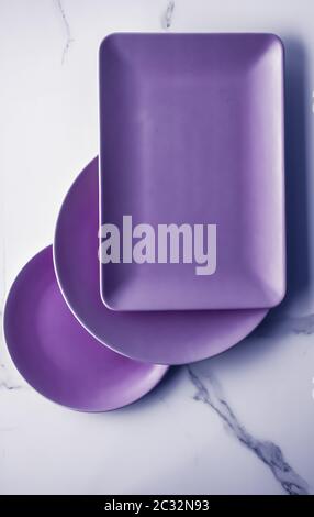 Purple empty plate on marble table background, tableware decor for ...