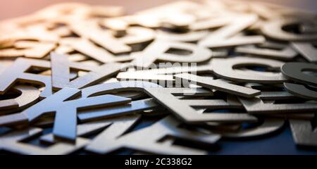 Mixed solid letters pile closeup photo. Education background concept ...