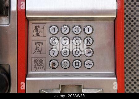 Public telephone metal keypad dial Stock Photo - Alamy