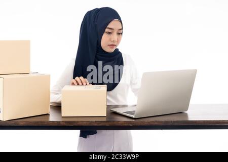 muslim online merchant selling Stock Photo - Alamy