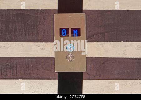 Modern lift call buttons with display Stock Photo - Alamy
