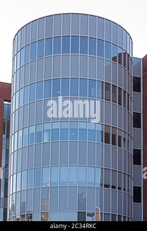 Curved Blue Glass Office Building Exterior Stock Photo - Alamy