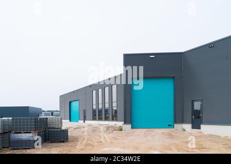 exterior of a new commercial warehouse under construction Stock Photo ...