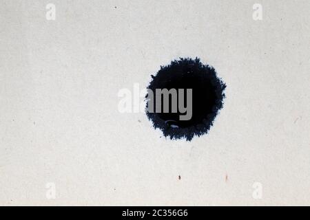 black spots ink blotches on an old yellowed piece of paper Stock Photo ...