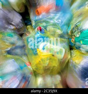 Bags with different garbage at home Stock Photo - Alamy