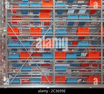 Warehouse Shelving System With Plastic Crates and Boxes Stock Photo - Alamy