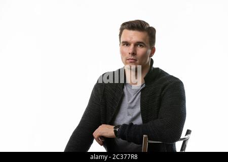Portrait of a young man in ordinary clothes, white background Stock ...