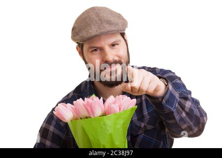 Handsome man holding bouquet of tulips Stock Photo - Alamy