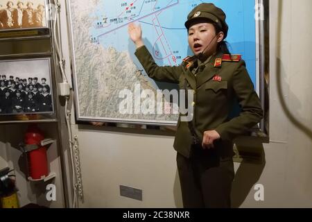 PYONGYANG, North Korea - A museum guide of the U.S. Navy vessel Pueblo ...