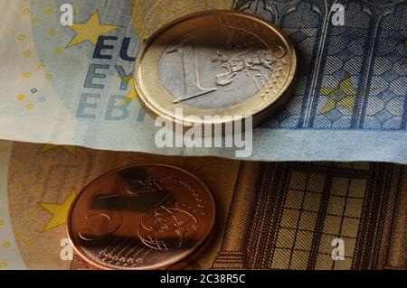 Euro banknotes and coins (EUR), currency of European Union Stock Photo ...