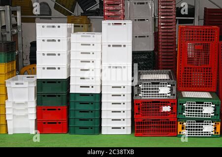 Plastic crates and cages for transportation at farm Stock Photo - Alamy