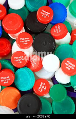 Plastic bottle lids with some saying 'please recycle me' Stock Photo ...
