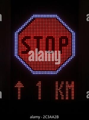 LED Lights Stop Sign With Message Lights Stock Photo - Alamy