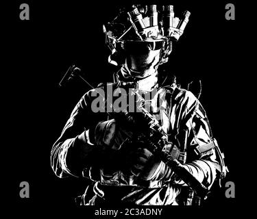 Special forces fighter armed with submachine gun and night vision ...