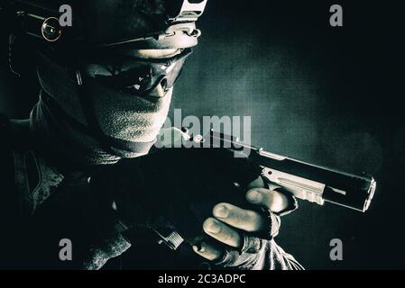 Armed SWAT fighter hiding behind ballistic shield Stock Photo - Alamy