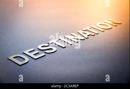 Word destination written with white solid letters on a board Stock ...