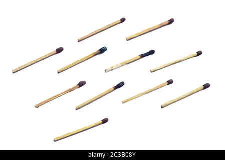 Different stages of match burning. Burnt matches on yellow background ...