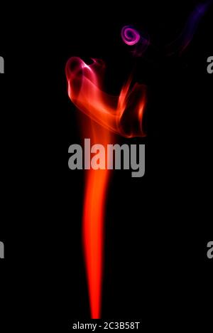 Curly white smoke lines isolated on black studio background Stock Photo ...