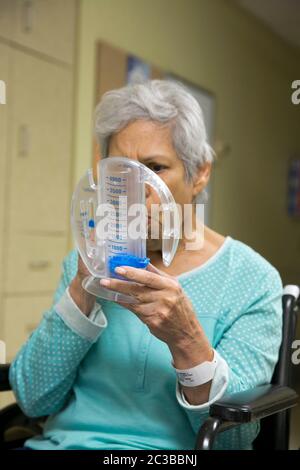 BREATHING, SPIROMETRY IN A WOMAN Stock Photo - Alamy