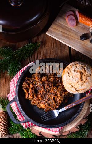 Polish bigos with sausage and mushrooms Stock Photo - Alamy
