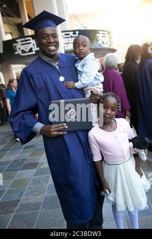 Graduate of Western Governors University poses for picture after ...