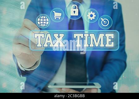 Writing note showing Tax Time. Business photo showcasing compulsory ...