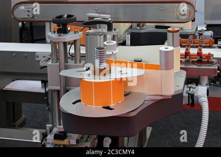 Automated labeling machine equipment with conveyor belt Stock Photo - Alamy