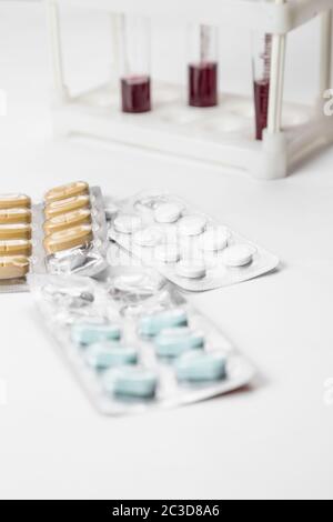 Blood in test tubes on blue background. Copy space Stock Photo - Alamy