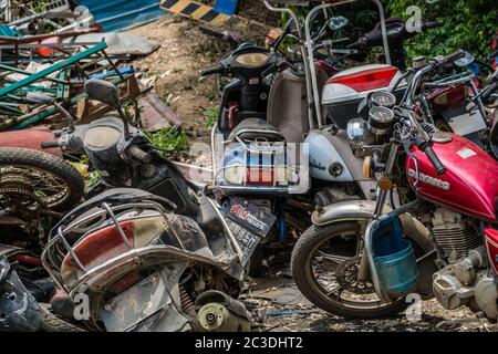 Motorcycle and scooter graveyard in China Stock Photo - Alamy