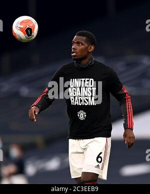 Paul Pogba of Manchester United wearing a PP earring during warmup ...
