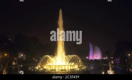 wide angle night shot of the magic fountain at park of the reserve in ...