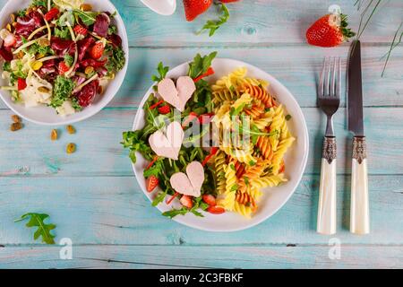 Valentines Day decoration from fusilli macaroni. Heart from spiral ...