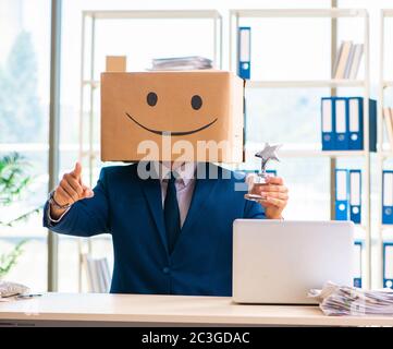 Happy man with box instead of his head Stock Photo - Alamy