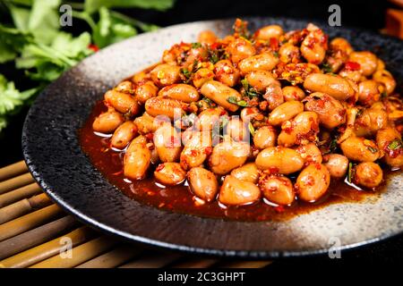 Delicious cold dishes spiced peanuts Stock Photo - Alamy