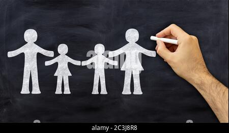 Parents mom dad and daughter chalkboard at kitchen, baking cake concept ...
