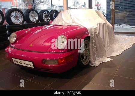 Pink Porsche 911 Carrera RS classic supercar attending a car gathering ...