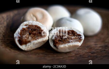 Mini Nopia or Mino. Indonesian cookies with brown sugar. Traditional ...