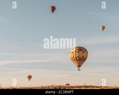 Parachutes flying up in the air during daytime Stock Photo - Alamy