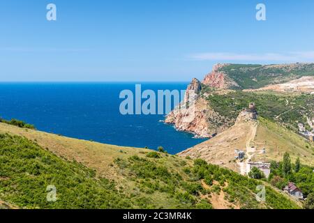 Scenic view of Balaklava bay with yachts and ruines of Genoese fortress ...