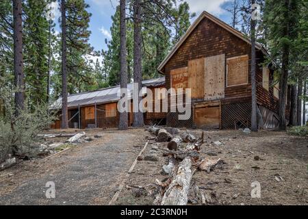 Unique boarded up building, historic wooden tankhouse and watchtower ...