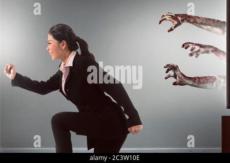 Scared young woman running away in the dark looking over shoulder Stock ...