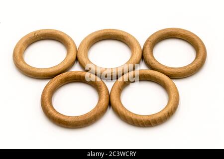 Olympic ring in wooden circle on a white background Stock Photo - Alamy