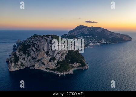 Aerial View of Villa Lysis / Fersen at sunset, submersed in the ...