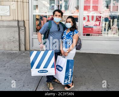 Retail stores start to serve customers indoors as New York City enters ...